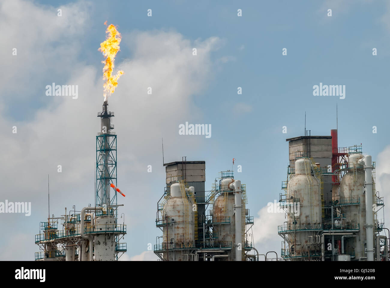 Oil refinery building industry Stock Photo - Alamy