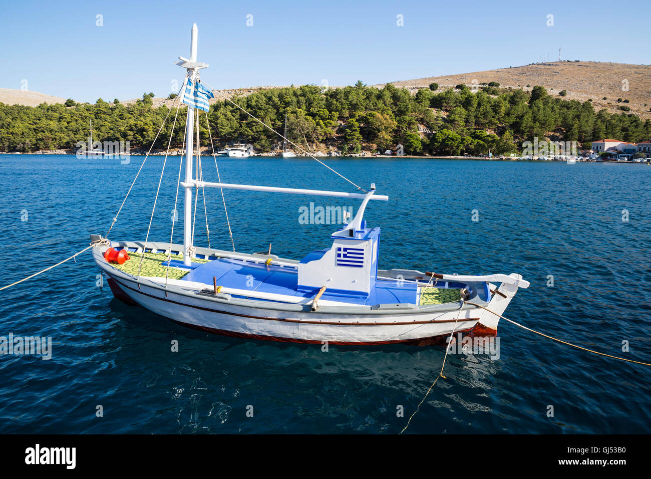 Small white traditional fishing boat hi-res stock photography and ...