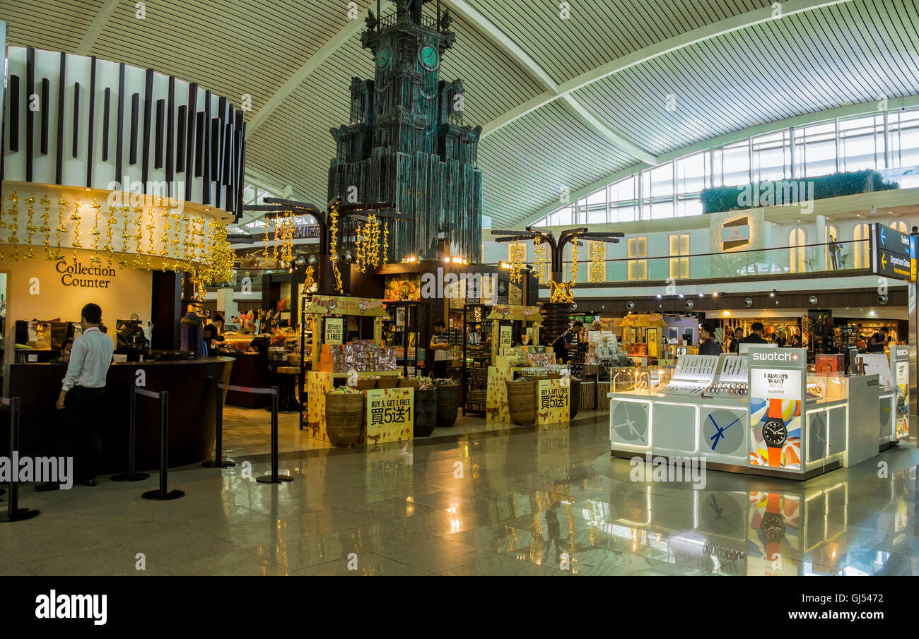 Inside Bali's international airport with people using various café's ...