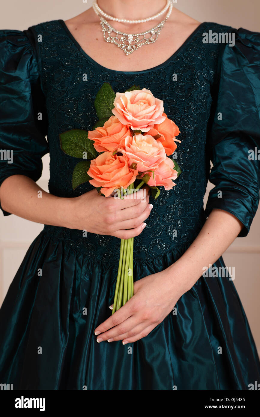 closeup Victorian woman holding roses Stock Photo - Alamy