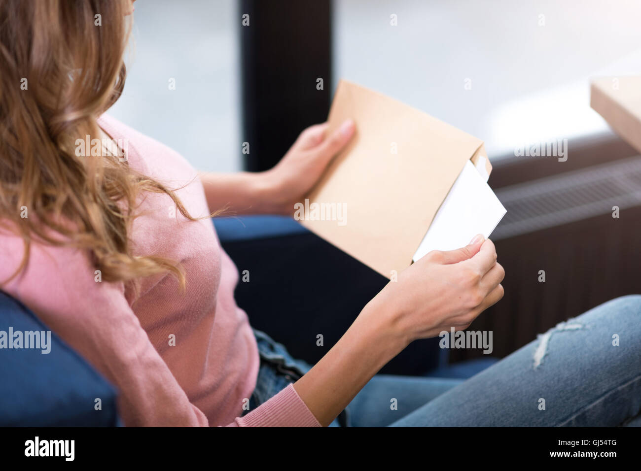 Woman inside envelope hi-res stock photography and images - Alamy