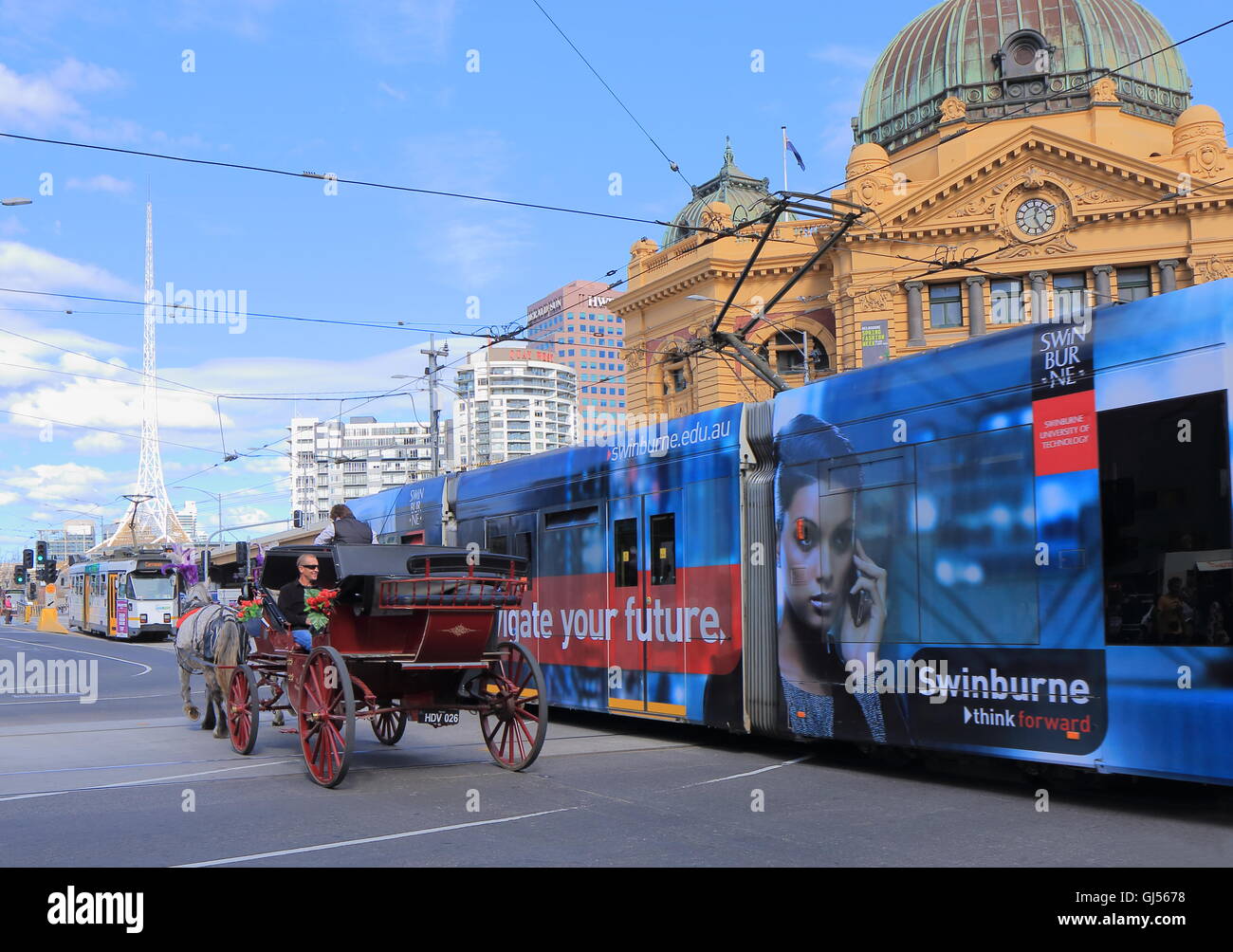 Tram passes iconic melbourne train hi-res stock photography and images ...