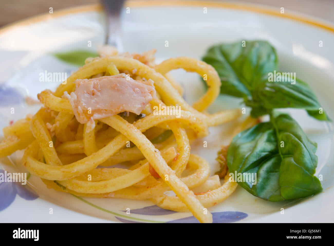 guitar spaghetti carbonara with cream and basil Stock Photo - Alamy