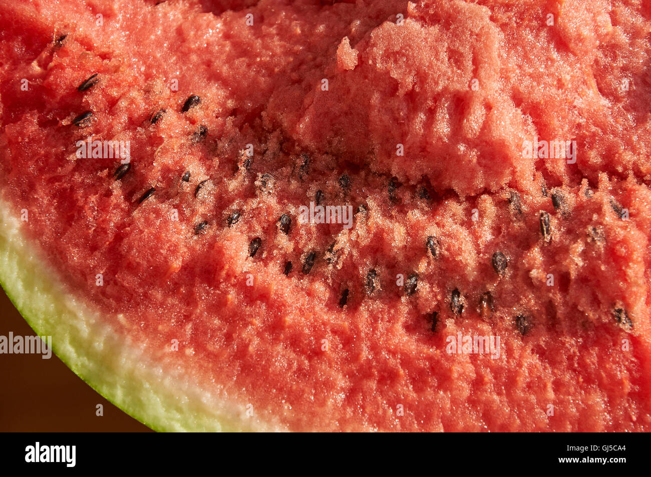 Big piece of red juicy smashed watermelon Stock Photo - Alamy