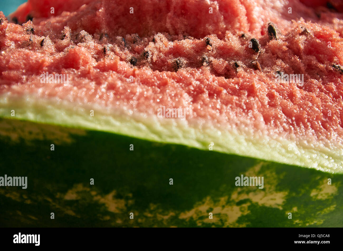 Big piece of red juicy smashed watermelon Stock Photo - Alamy