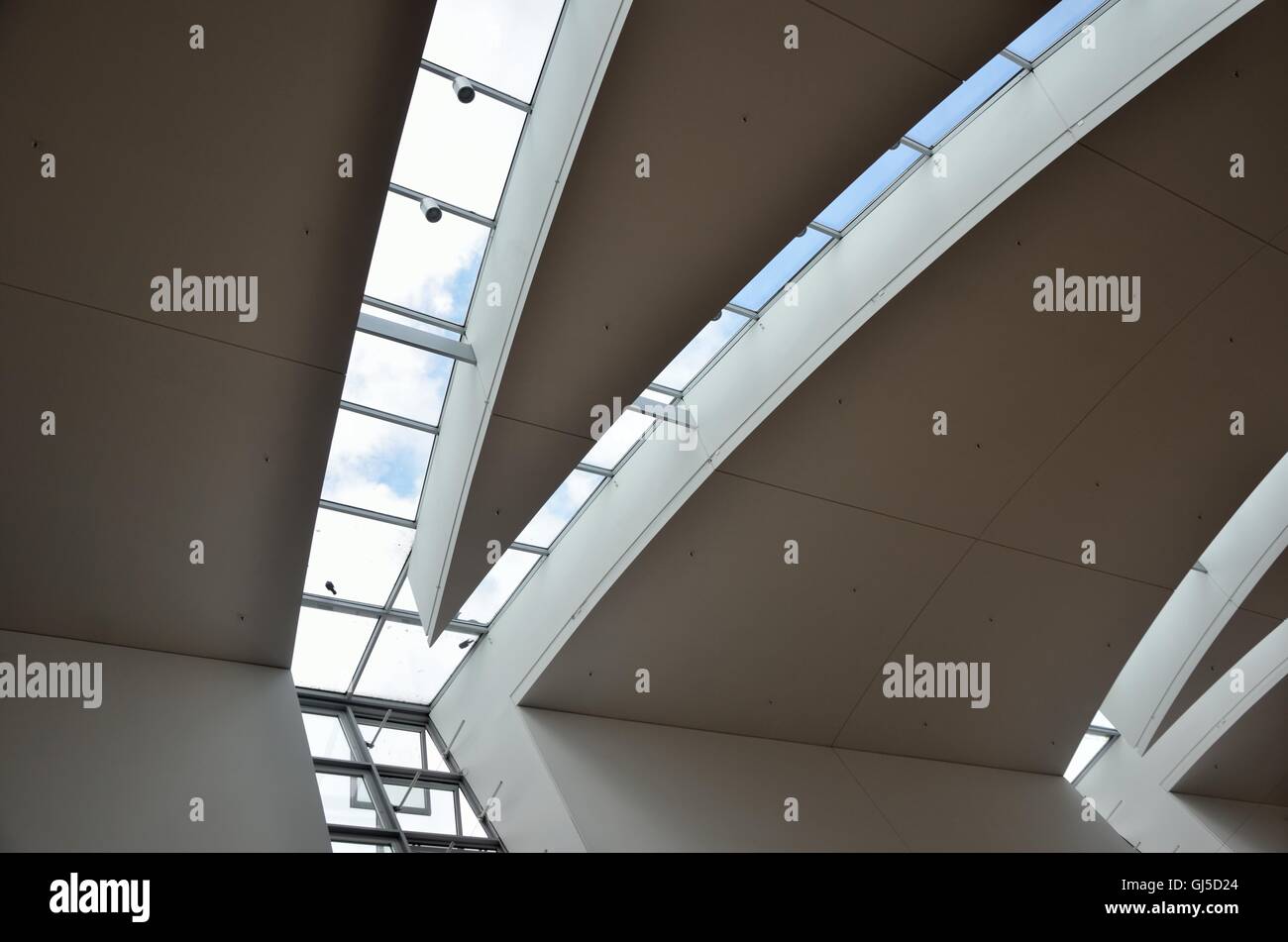 open windows in a roof architectural detail Stock Photo - Alamy