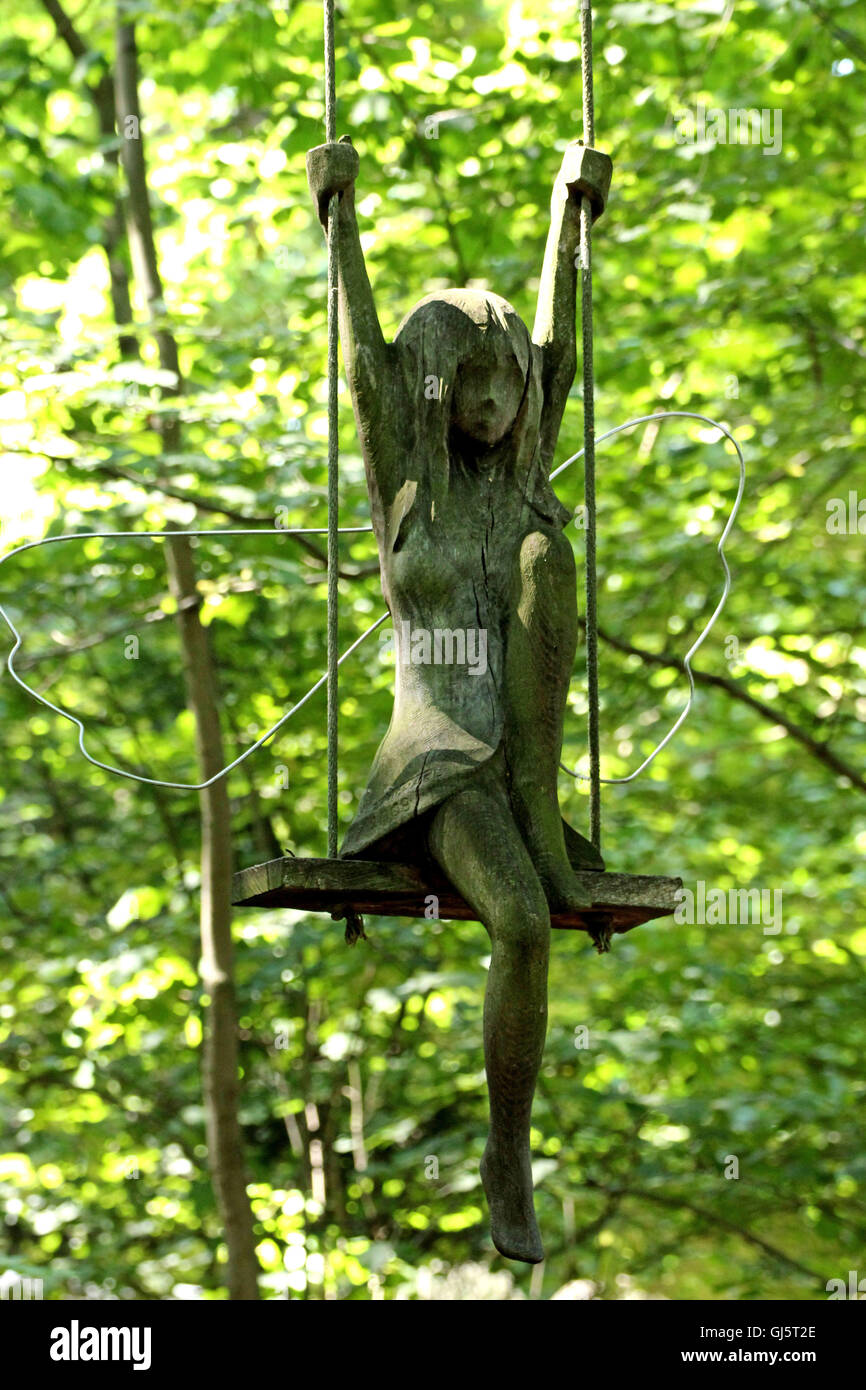 Forest, figure of fairy, swing Stock Photo - Alamy