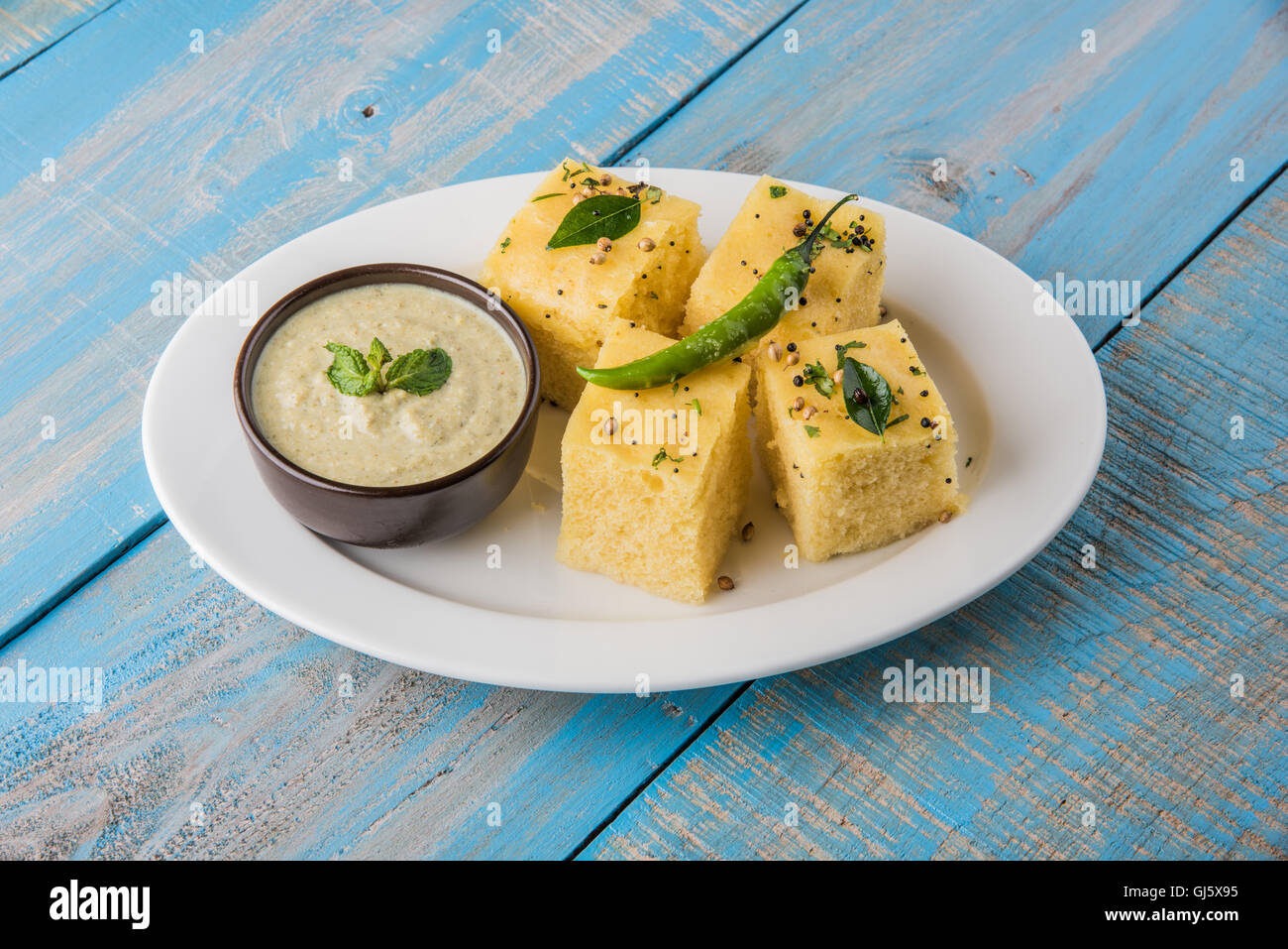 favourite Gujrati snack, khaman Dhokla made up of gram flour, semolina ...