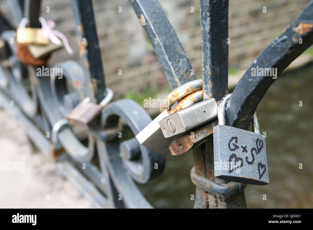 Love Padlocks on bridge over River Vilnia. The love padlocks have the ...