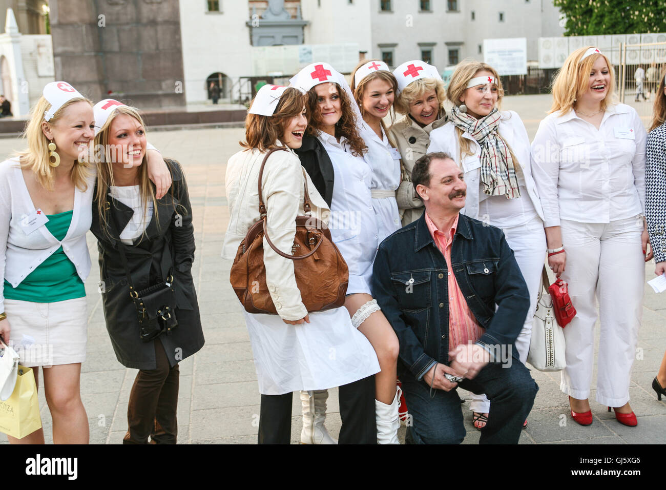 Hens, from a, hen party, hen,dressed as, nurses, in the, Old Town, of ...