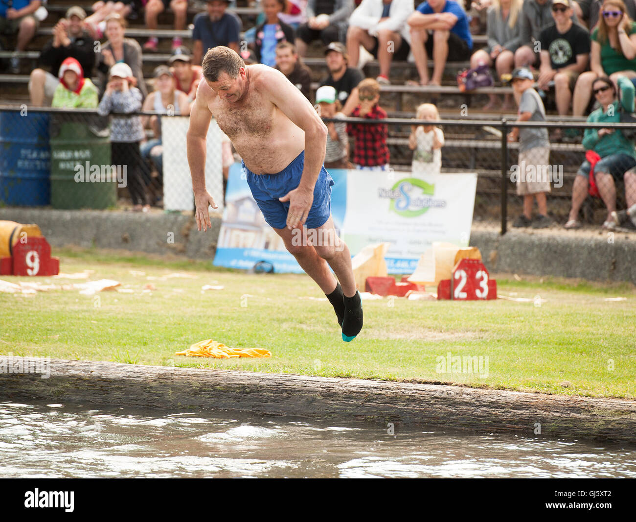 A competitor takes a dive after the open team relay event. The Squamish ...