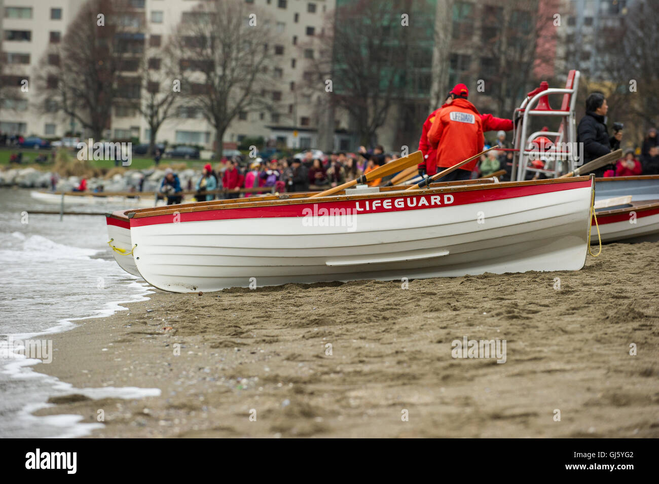 Wooden Lifeguard boat sits ready on English Bay shoreline, Vancouver ...