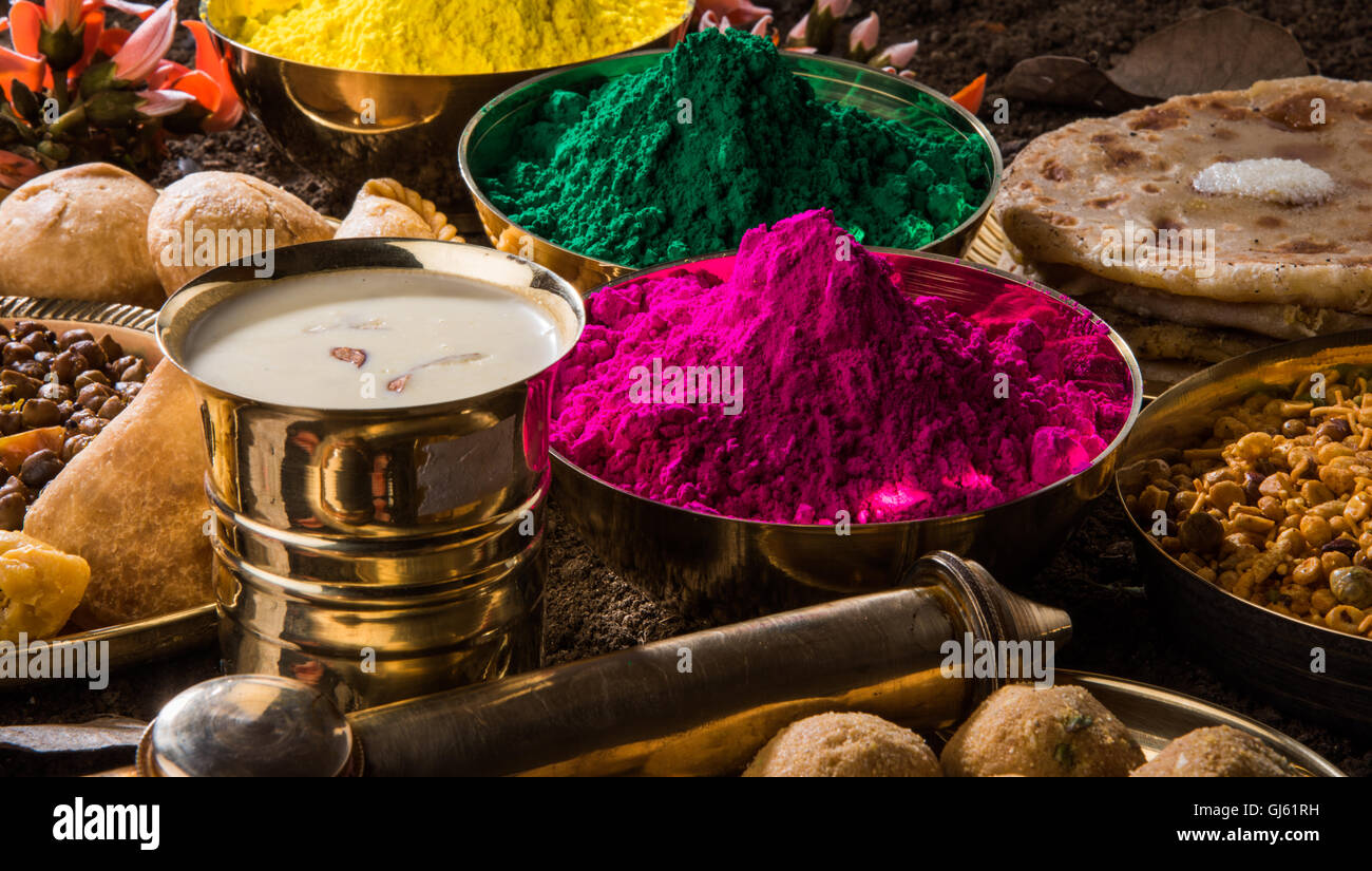 holi festival food with colours, indian festival holi, samosa, kachori ...