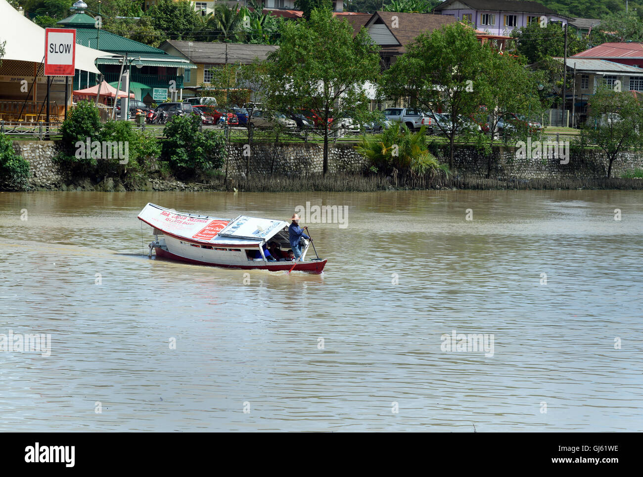 Kuching, Malaysia. Traditional boat on Sarawak river from waterfront in ...
