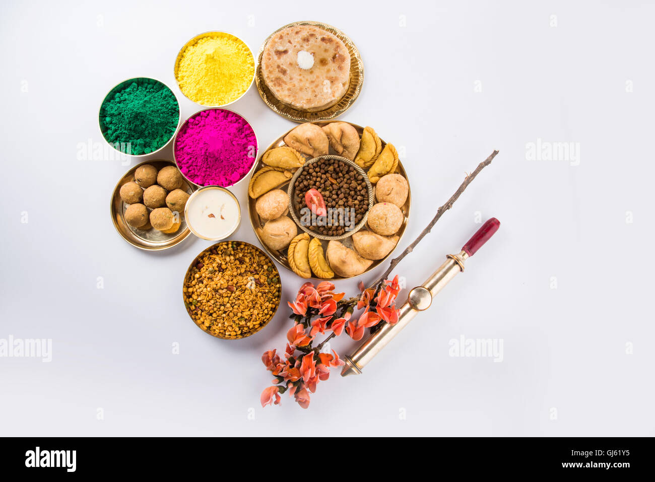 holi festival food with colours, indian festival holi, samosa, kachori ...