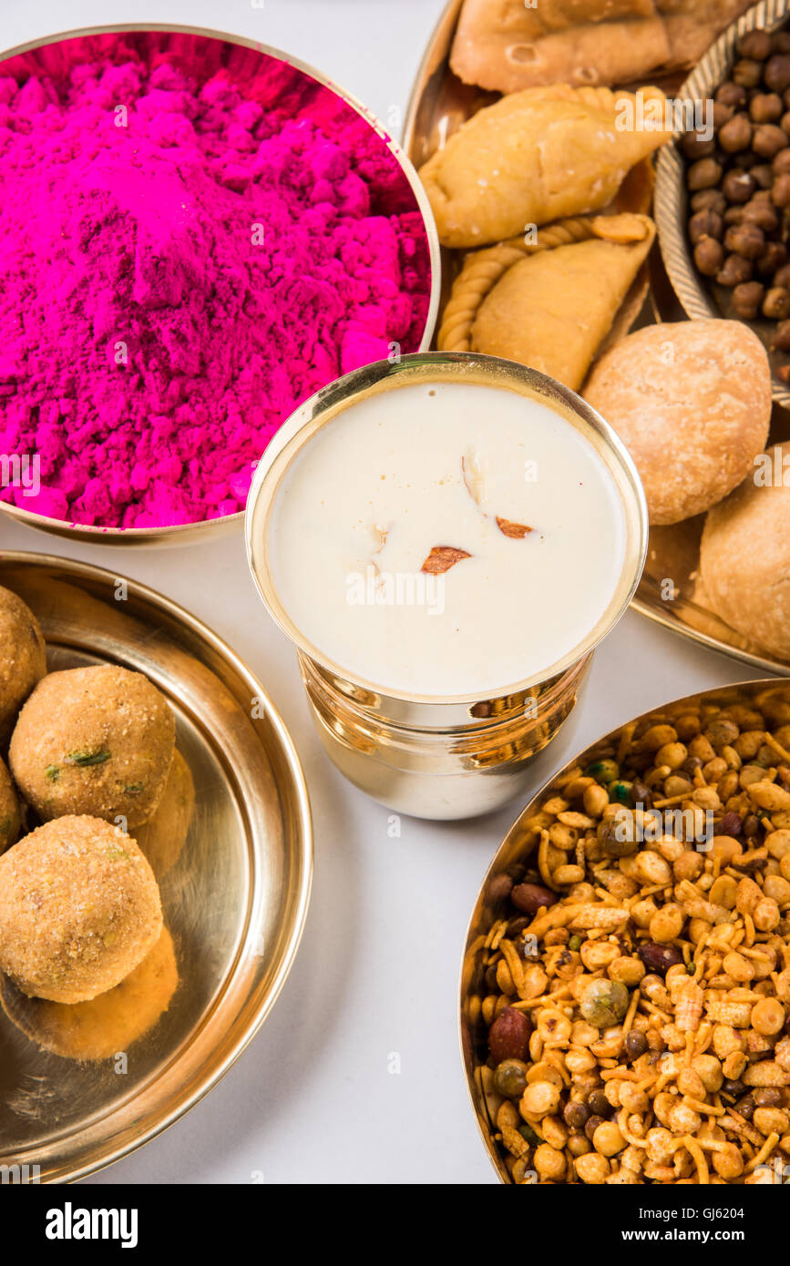 holi festival food with colours, indian festival holi, samosa, kachori ...