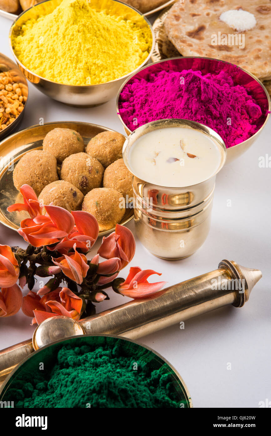 holi festival food with colours, indian festival holi, samosa, kachori ...