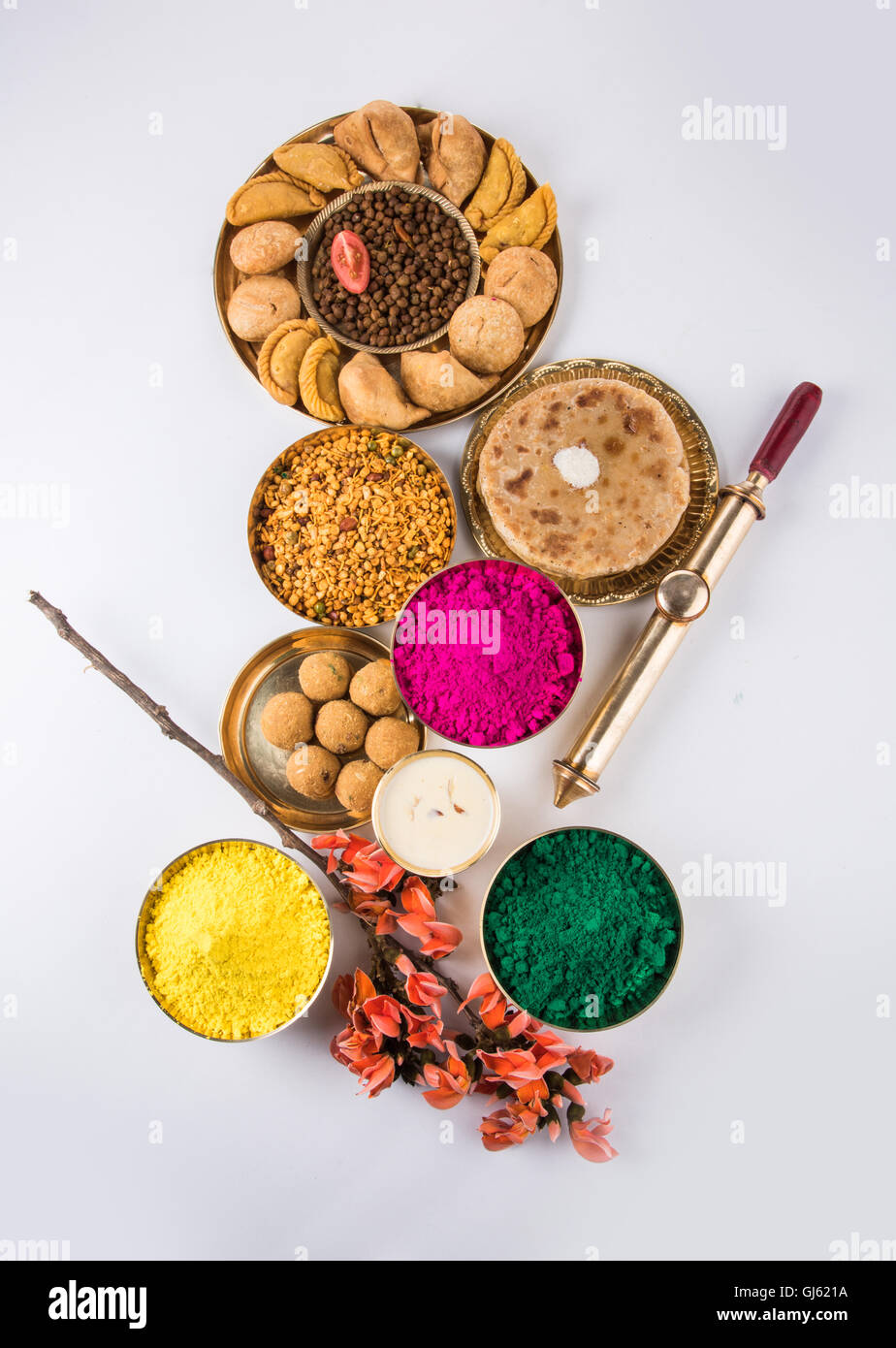 holi festival food with colours, indian festival holi, samosa, kachori ...