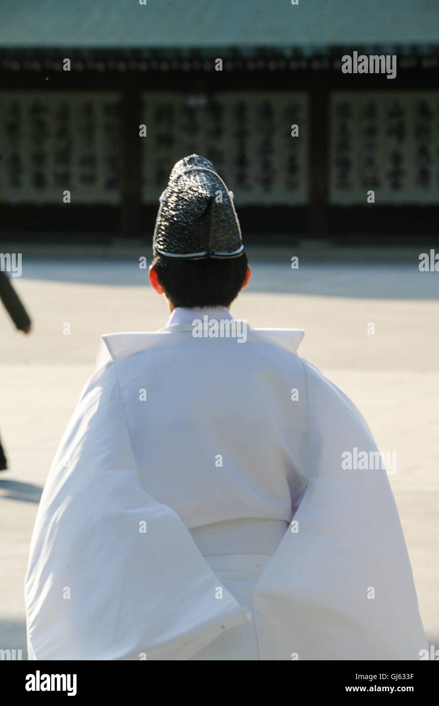 Shinto priest at a traditional Japanese Shinto wedding ceremony at ...
