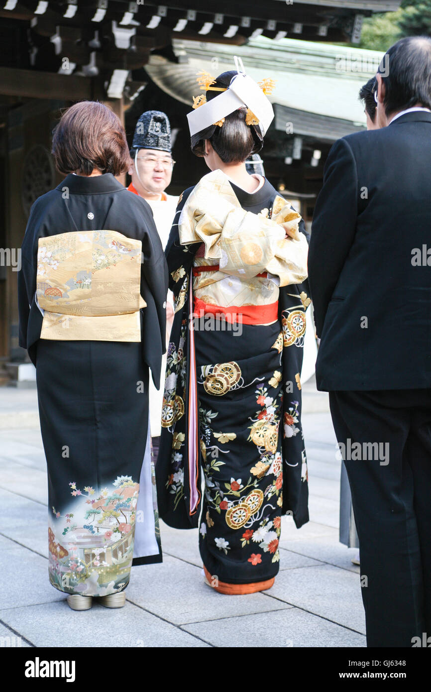 At a traditional Japanese Shinto wedding ceremony at Meiji Jingu Shrine ...