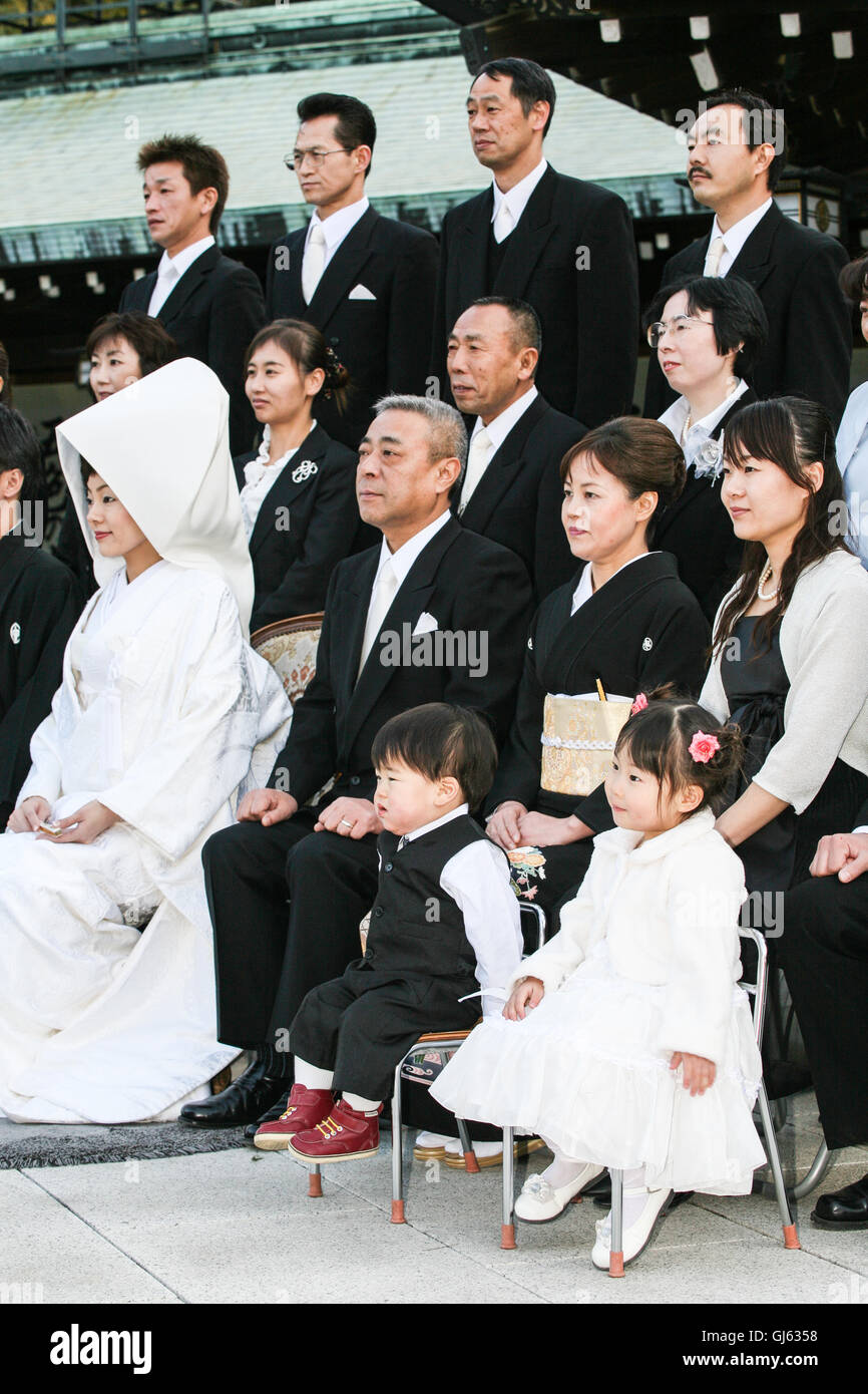 At a traditional Japanese Shinto wedding ceremony, the bride and groom ...