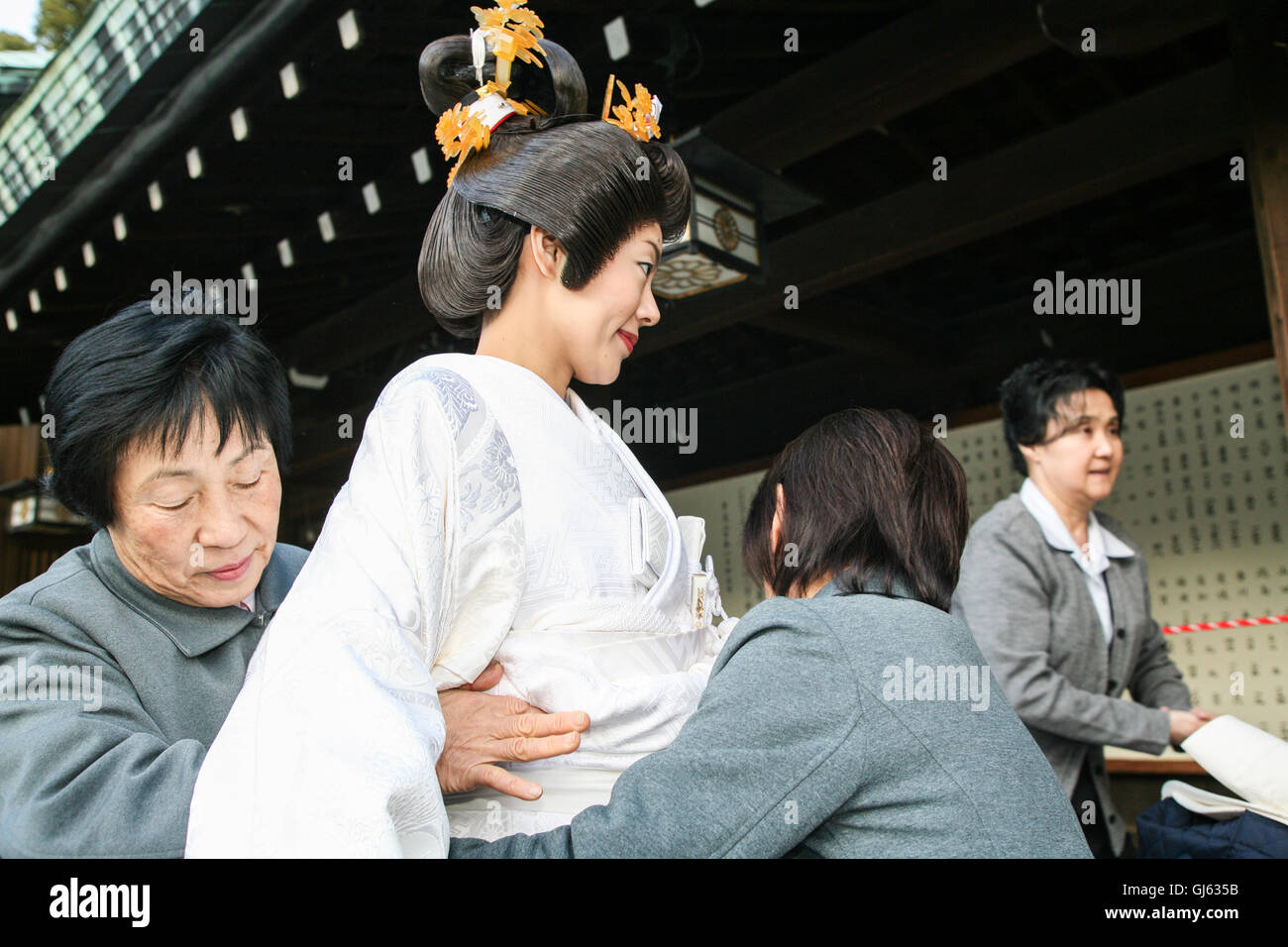 At a traditional Japanese Shinto wedding ceremony, after at a formal ...