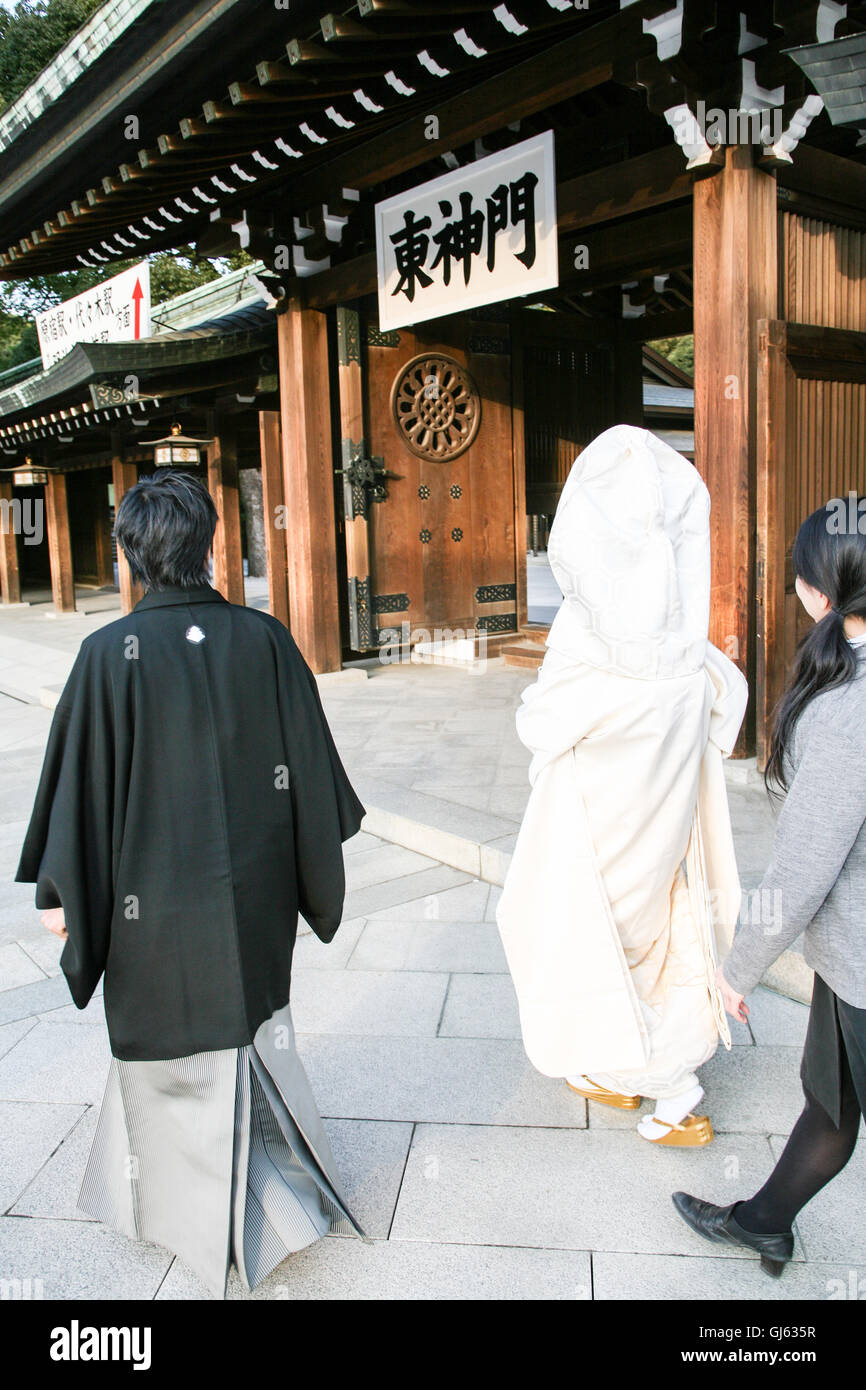 At a traditional Japanese Shinto wedding ceremony, after the wedding ...