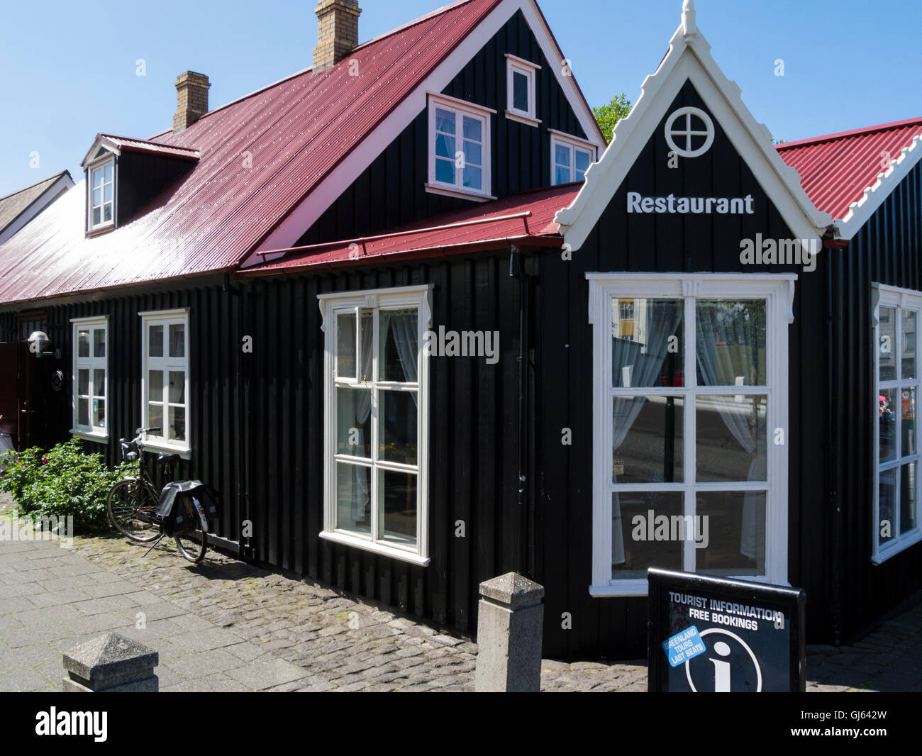 Restaurant in old black coloured wooden building in Reykjavik historic ...