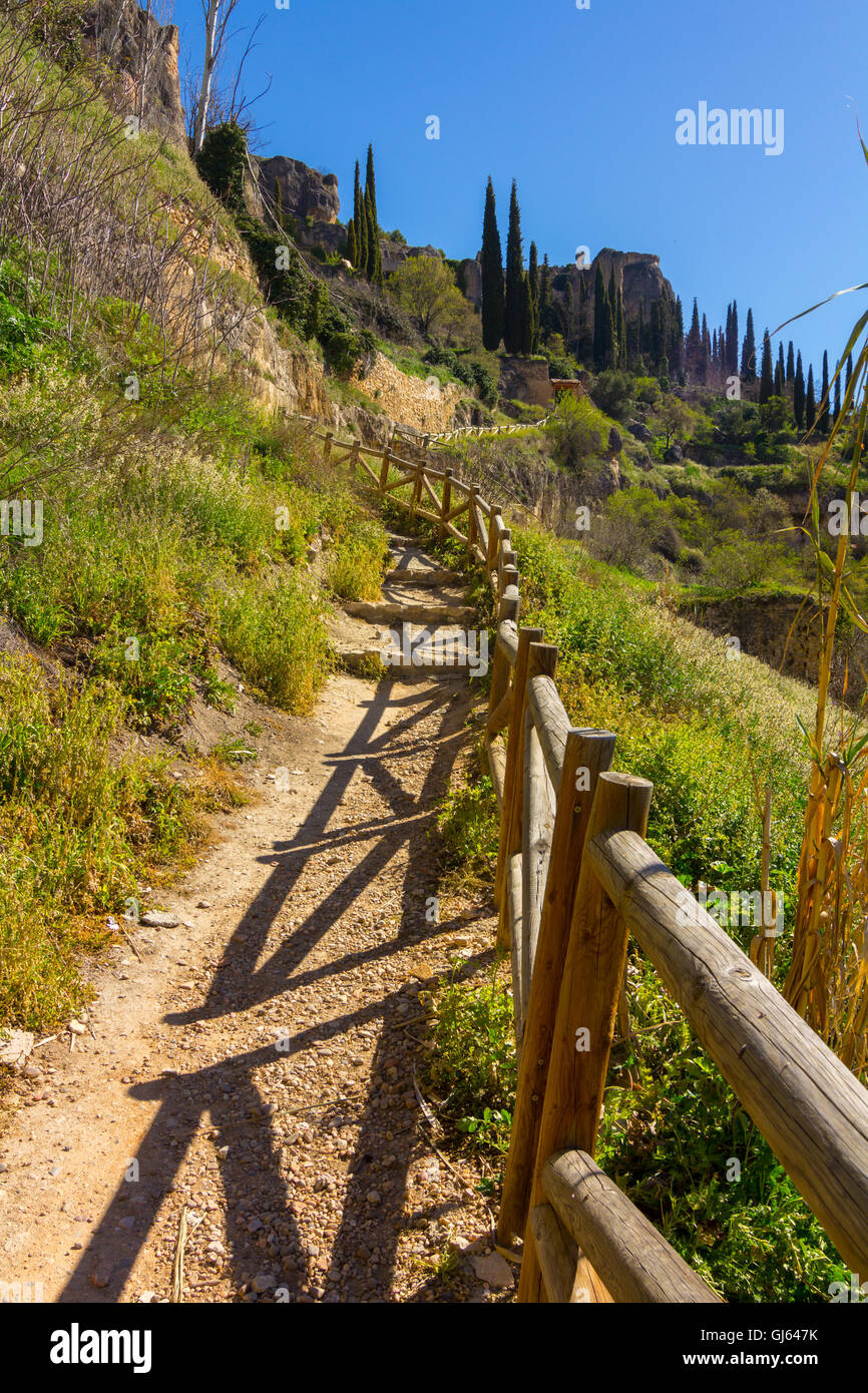 Path with wooden railing in the countryside, in the city of Cuenca ...