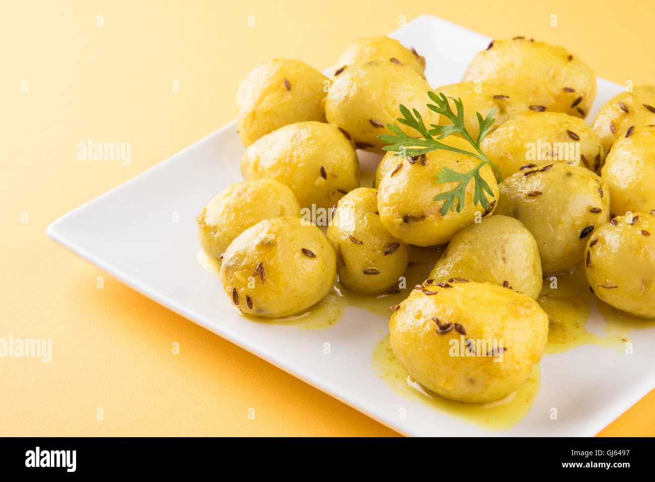 aloo fry or dry potato curry with chapati or roti or indian bread Stock ...