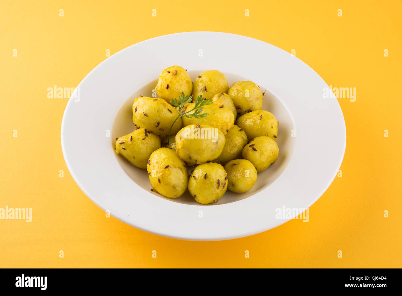 aloo fry or dry potato curry with chapati or roti or indian bread Stock ...