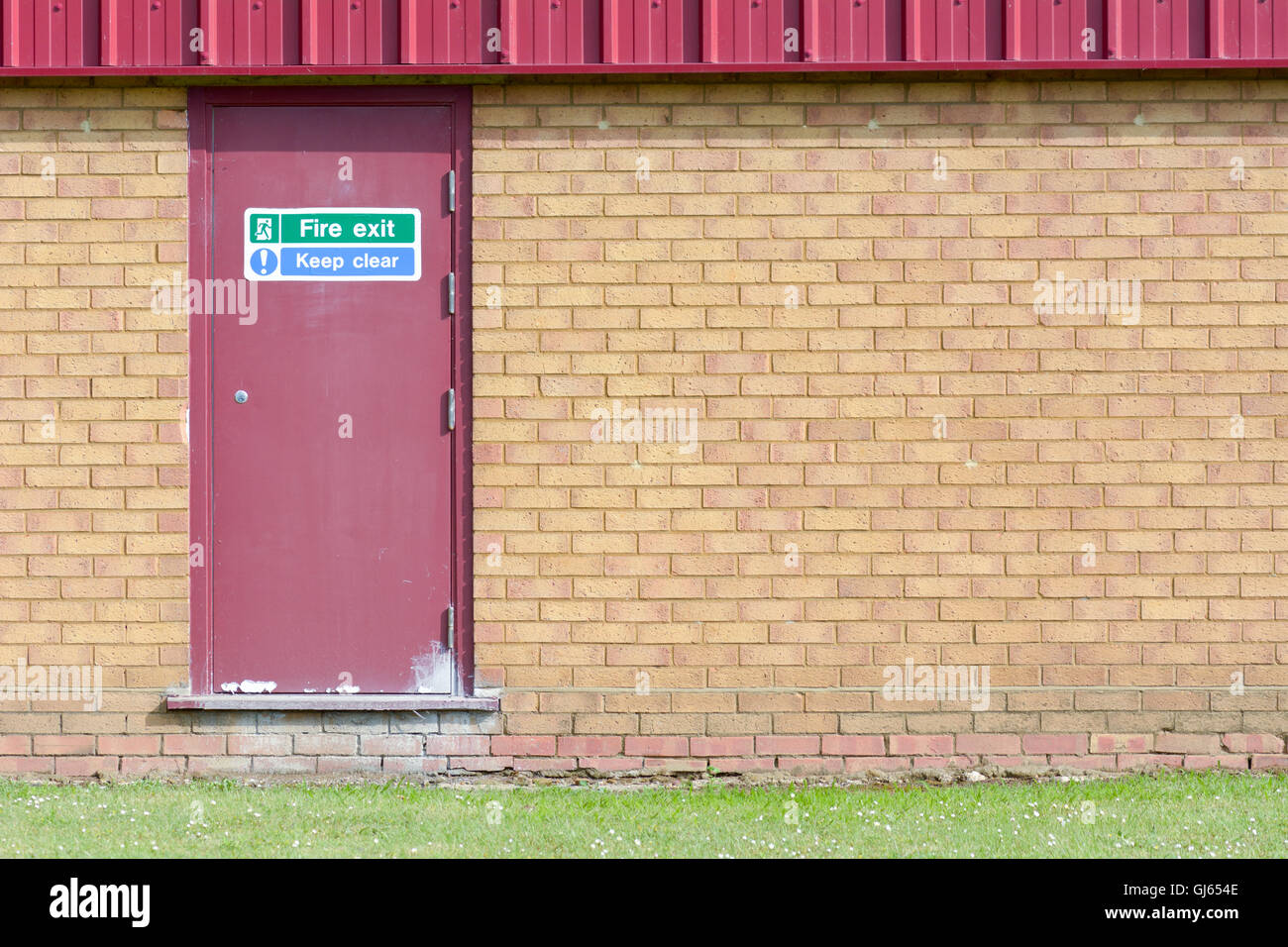 Fire exit door at factory unit Stock Photo - Alamy