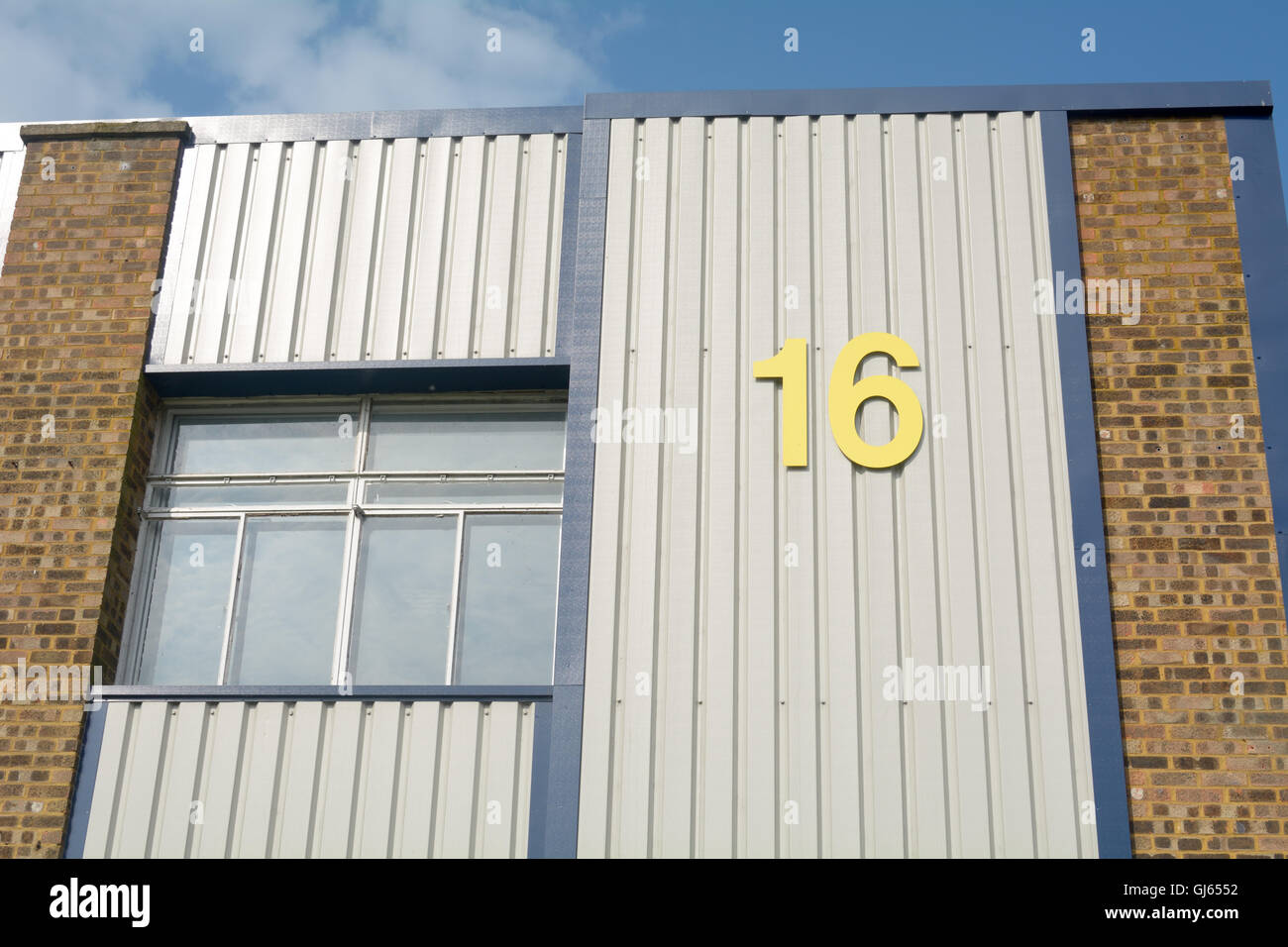 Factory unit number 16 sign Stock Photo - Alamy