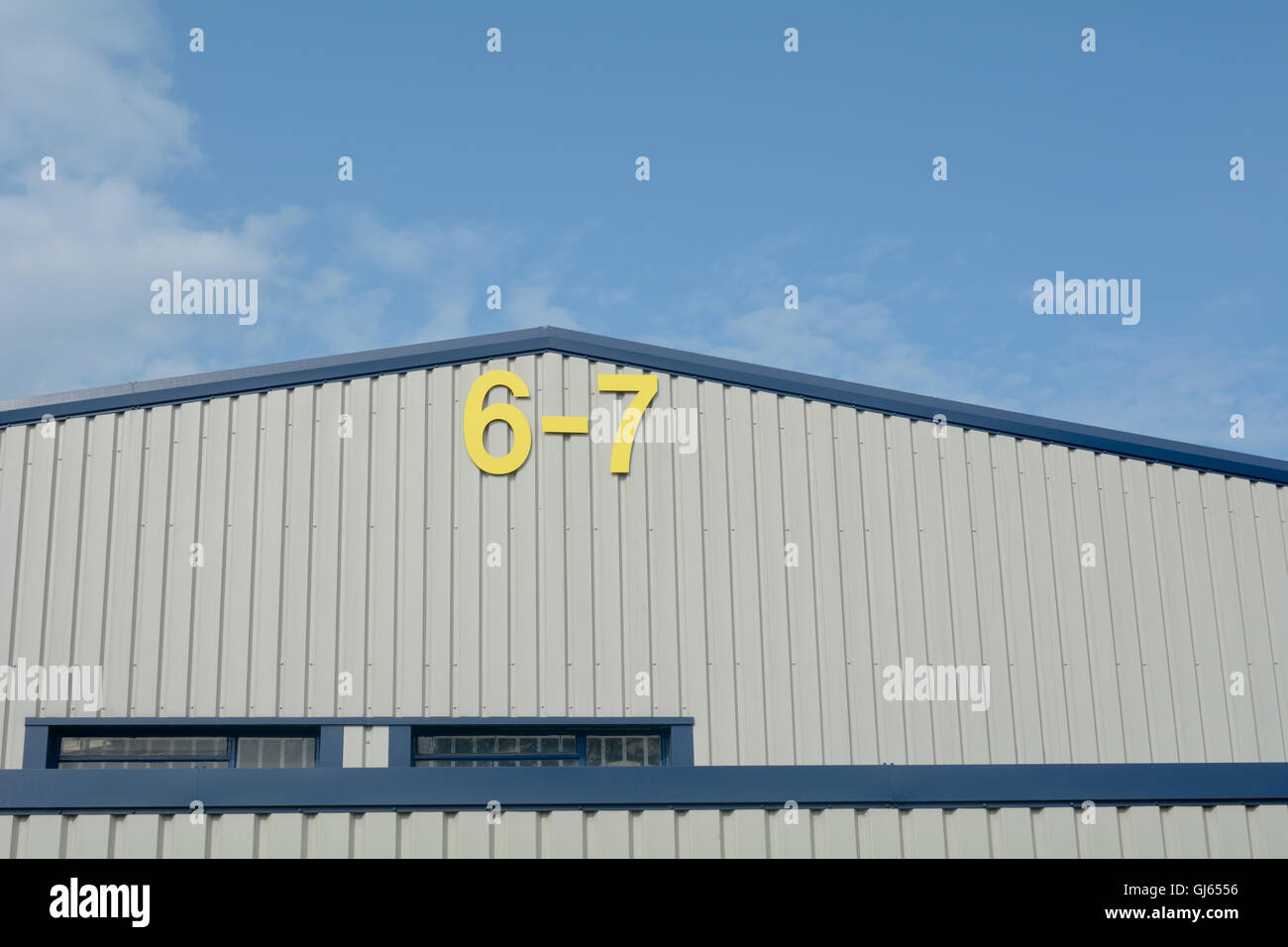 Factory unit number 6 and 7 signs Stock Photo - Alamy
