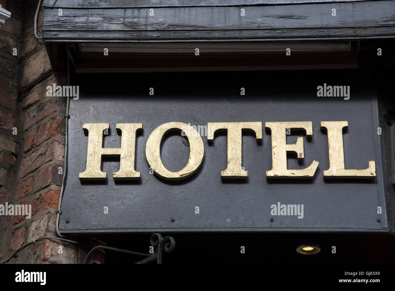 Hotel Sign on Building Facade Stock Photo - Alamy