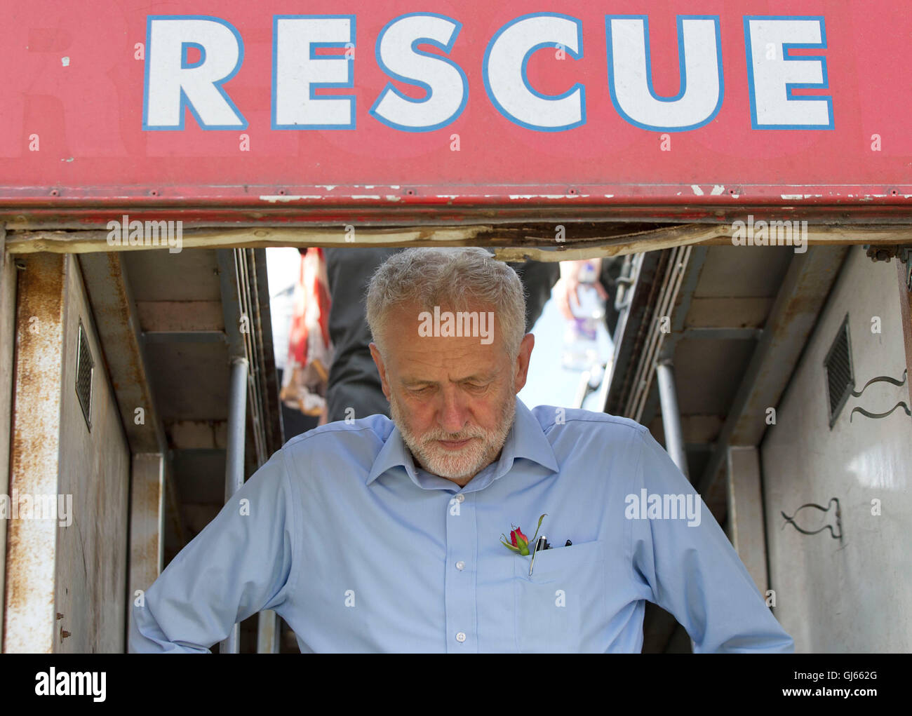 Jeremy Corbyn steps off the back of a fire engine after speaking at a ...