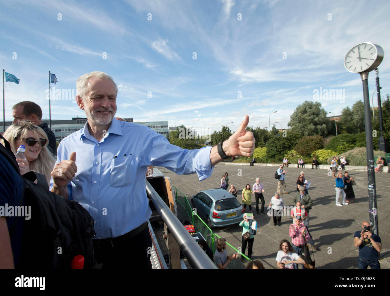Labour leader Jeremy Corbyn gives a thumbs up after speaking on top of ...
