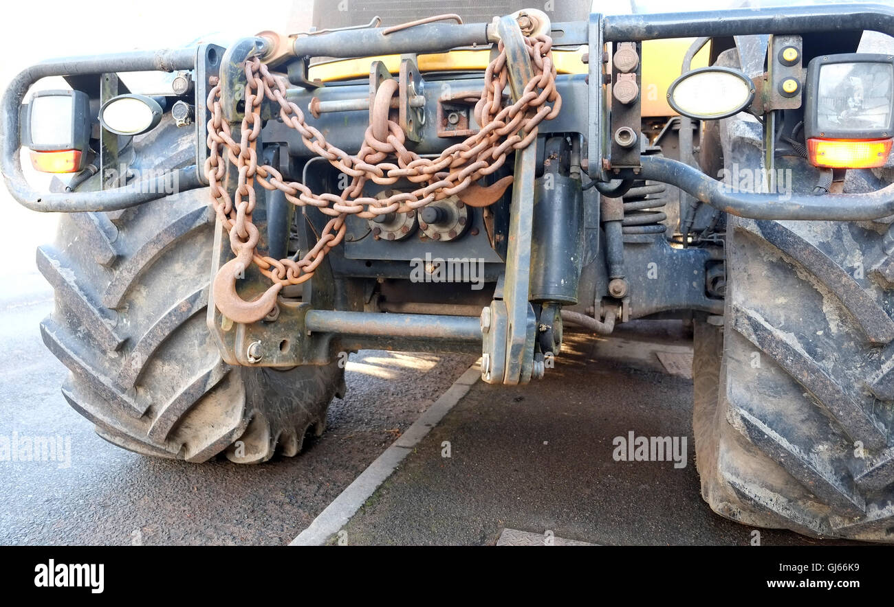 Strong chains on the front of a heavy farm tractor Stock Photo - Alamy