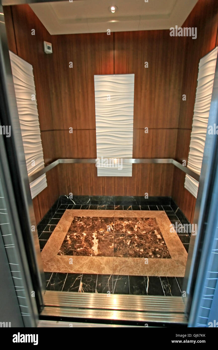 The interior of an elevator with a marble floor Stock Photo - Alamy