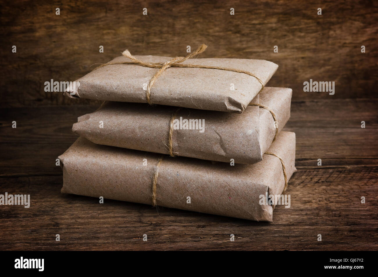 Postage on the background of an old board Stock Photo - Alamy
