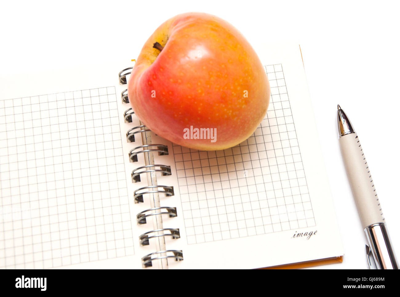 open spiral bound notebook with pen Stock Photo - Alamy