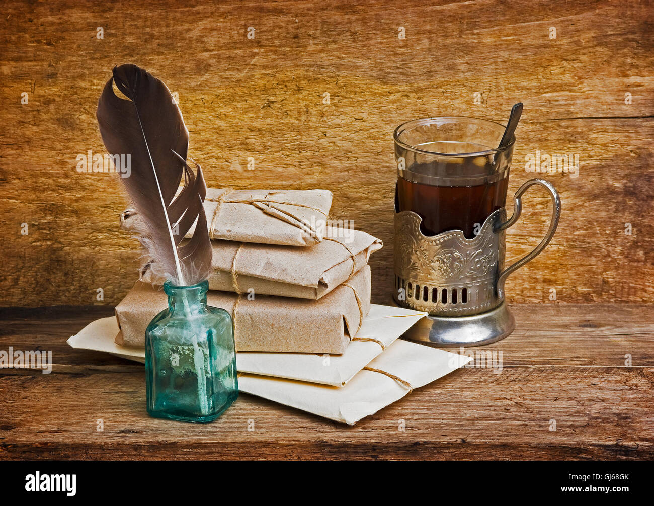 Postage on the background of an old board Stock Photo - Alamy