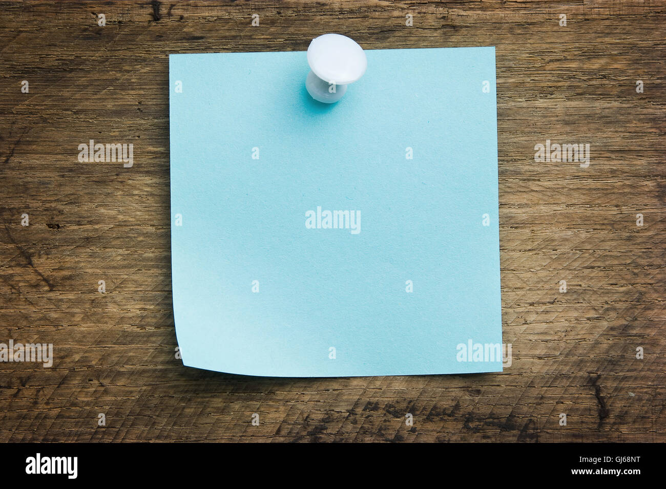A piece of paper pinned the button Stock Photo - Alamy