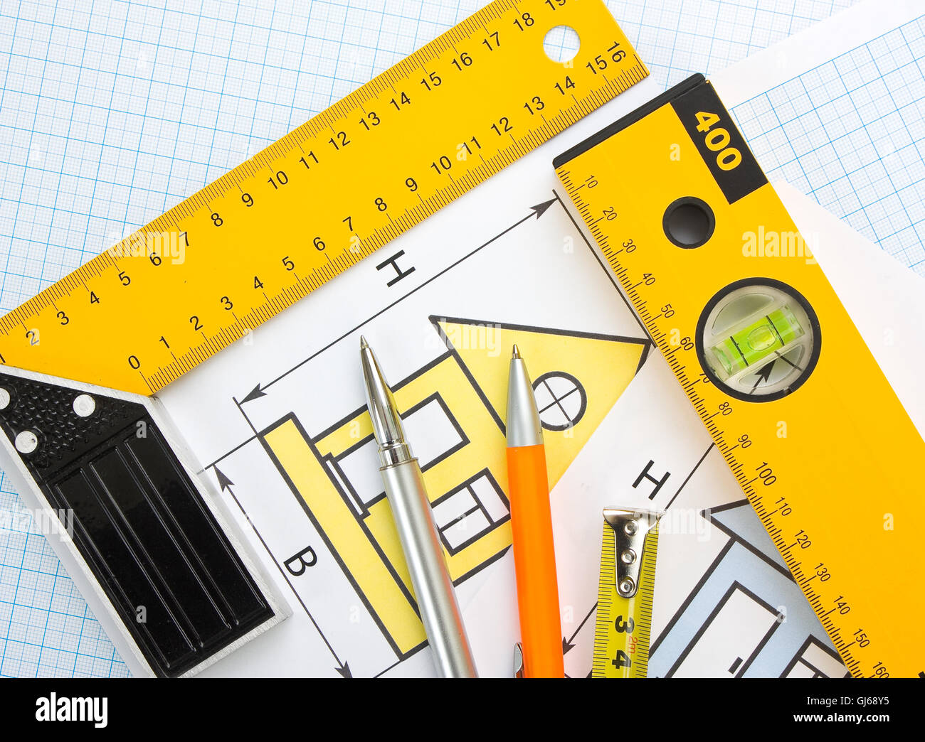 drawing at home with construction tools Stock Photo - Alamy
