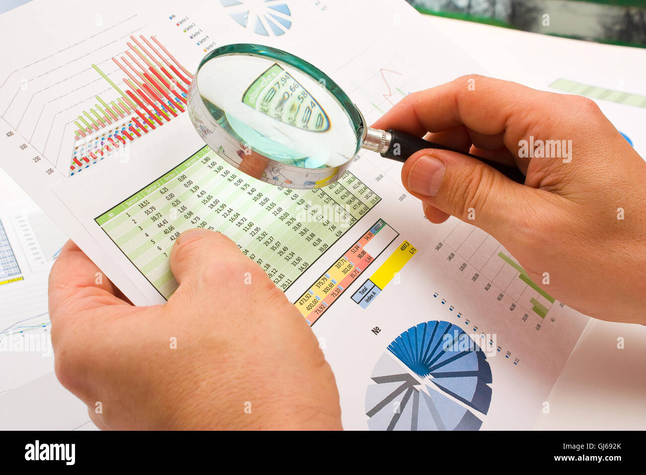 Graphs tables and documents Stock Photo - Alamy