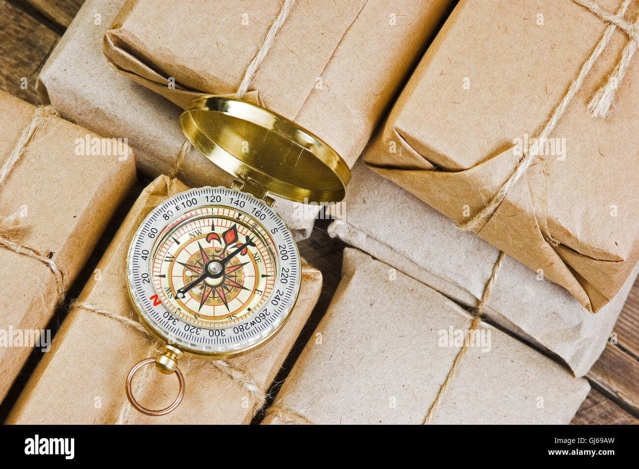 Postage on the background of an old board Stock Photo - Alamy
