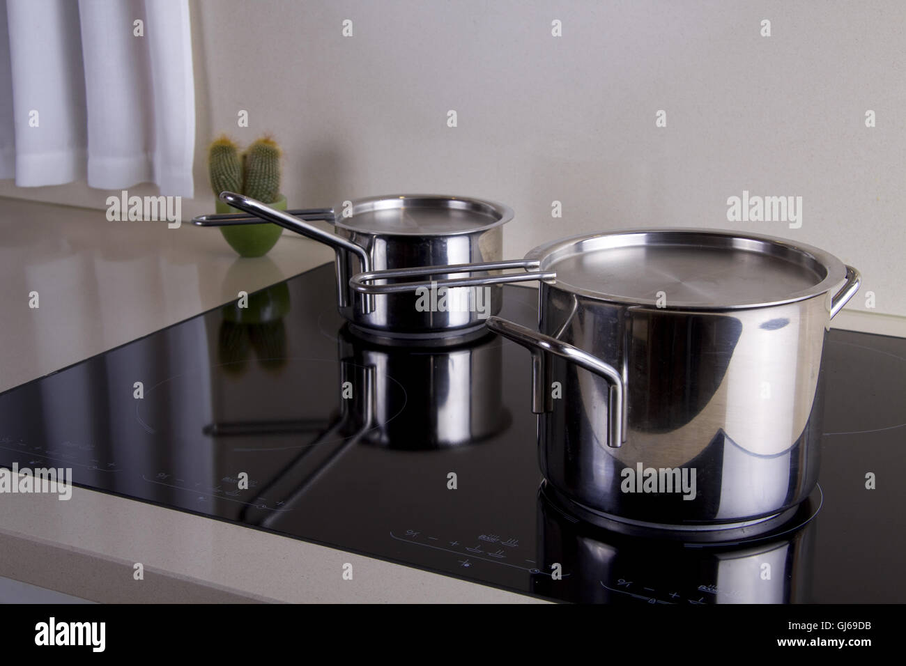 Two sauce pans Stock Photo - Alamy