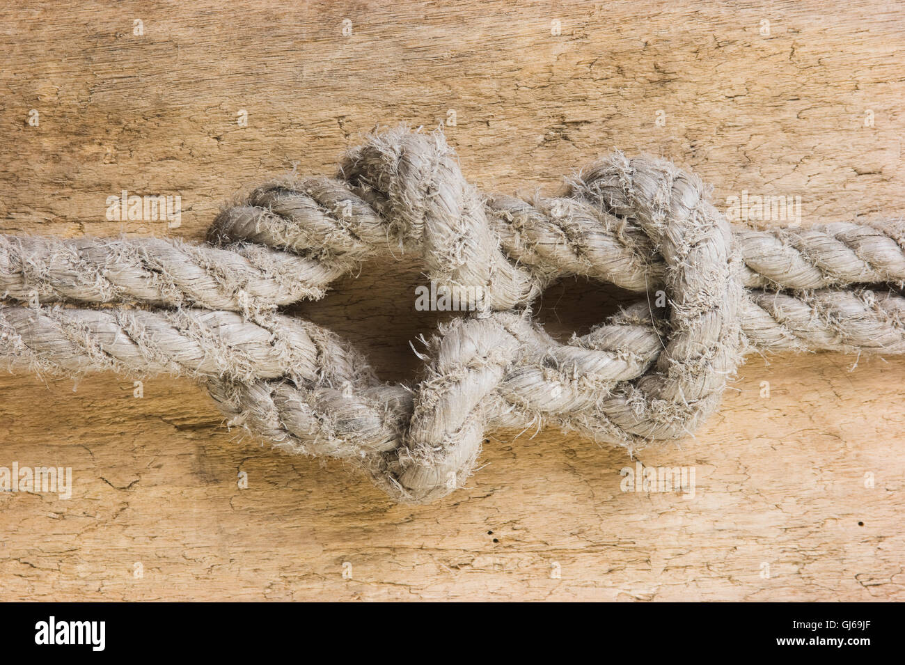 Rope with knots Stock Photo - Alamy