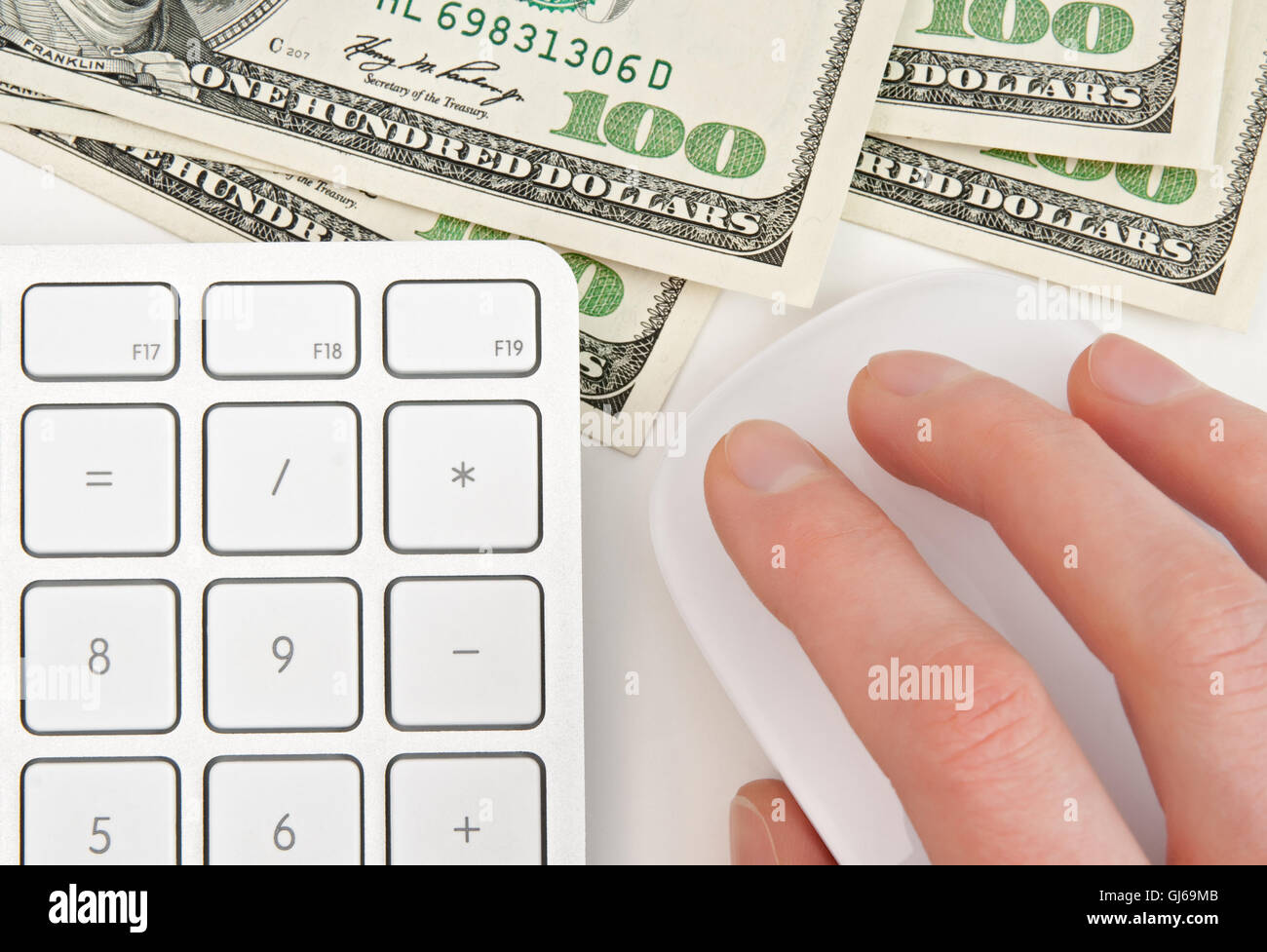Keyboard dollar bills female hi-res stock photography and images - Alamy