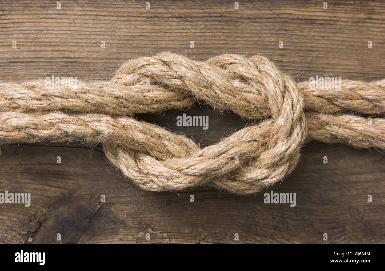 Rope with knots Stock Photo - Alamy